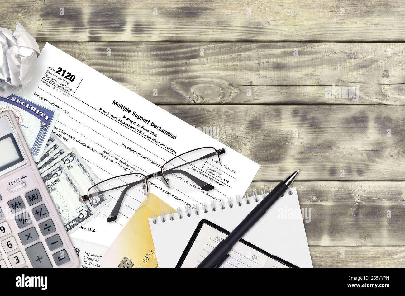 IRS form 2120 Multiple support declaration lies on flat lay office ...