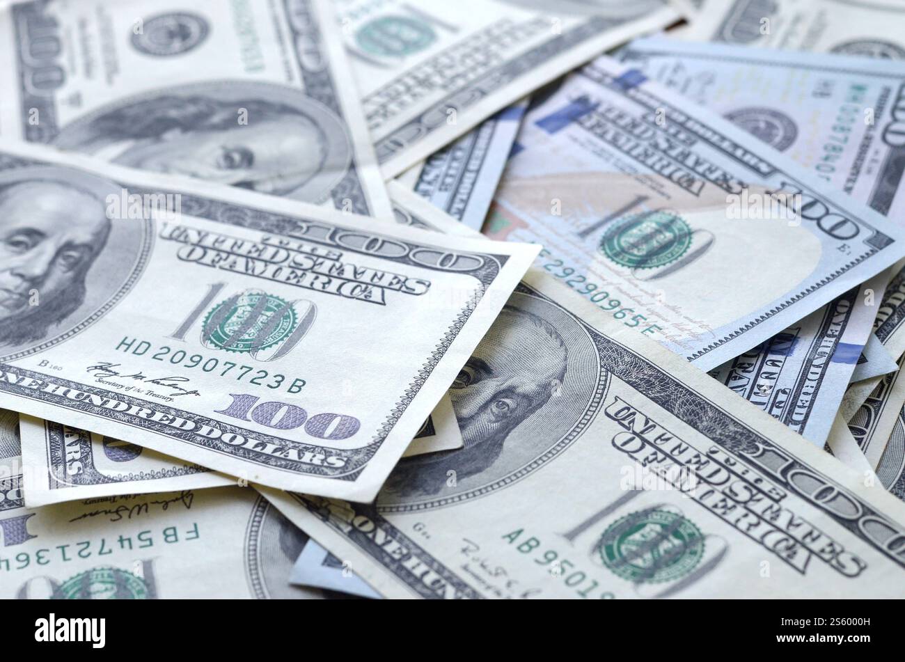 Background of 100 dollar bills. Abstract textured backdrop with many ...