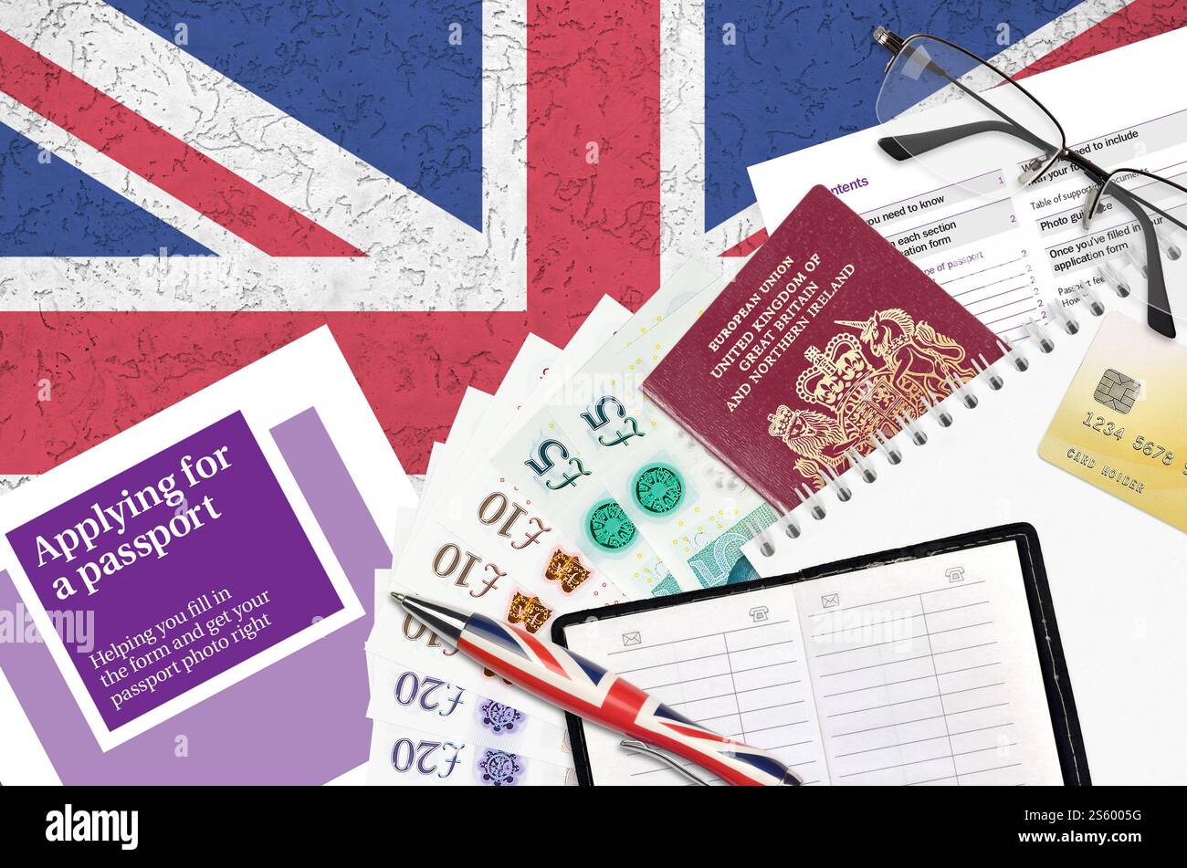 English violet guide Applying for a passport lies on table with office ...
