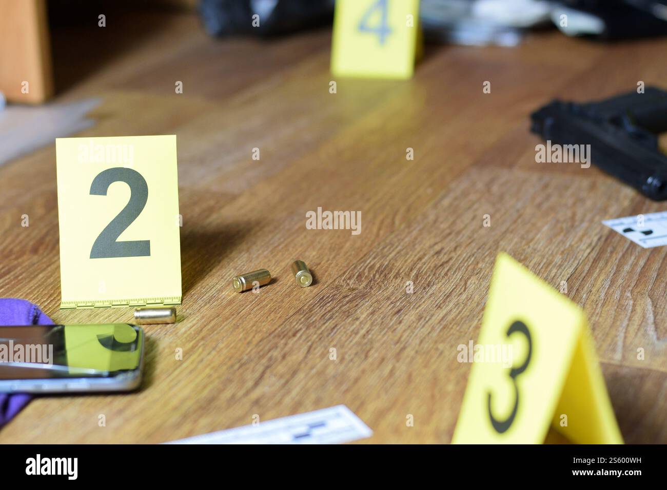 Id tents at crime scene after gunfight indoors. Gun cartridges as ...