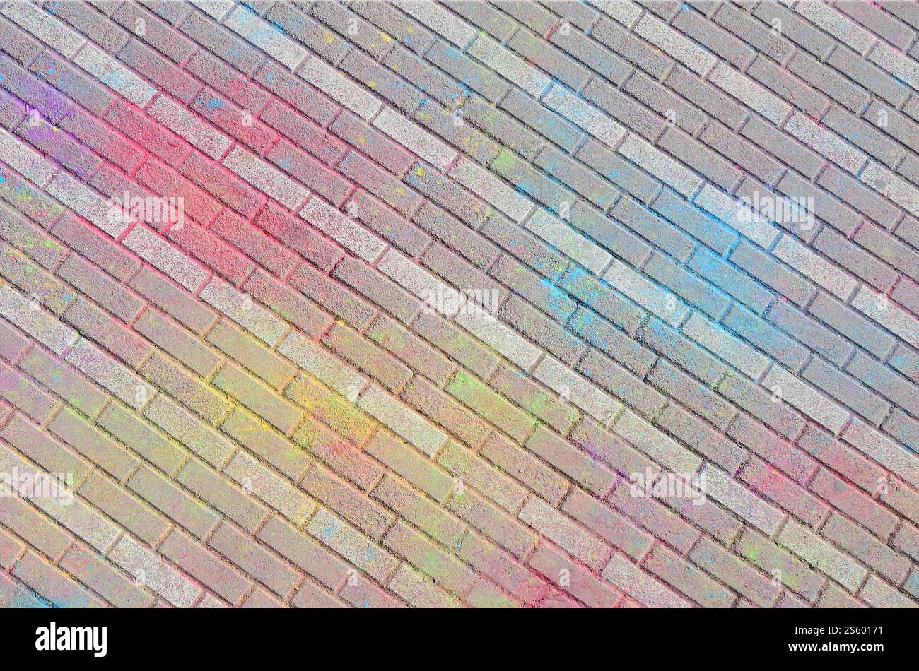 Multi colored earth, paving slabs, powder coated with dry colors at the ...