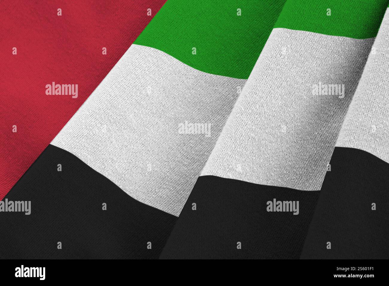 United Arab Emirates flag with big folds waving close up under the ...