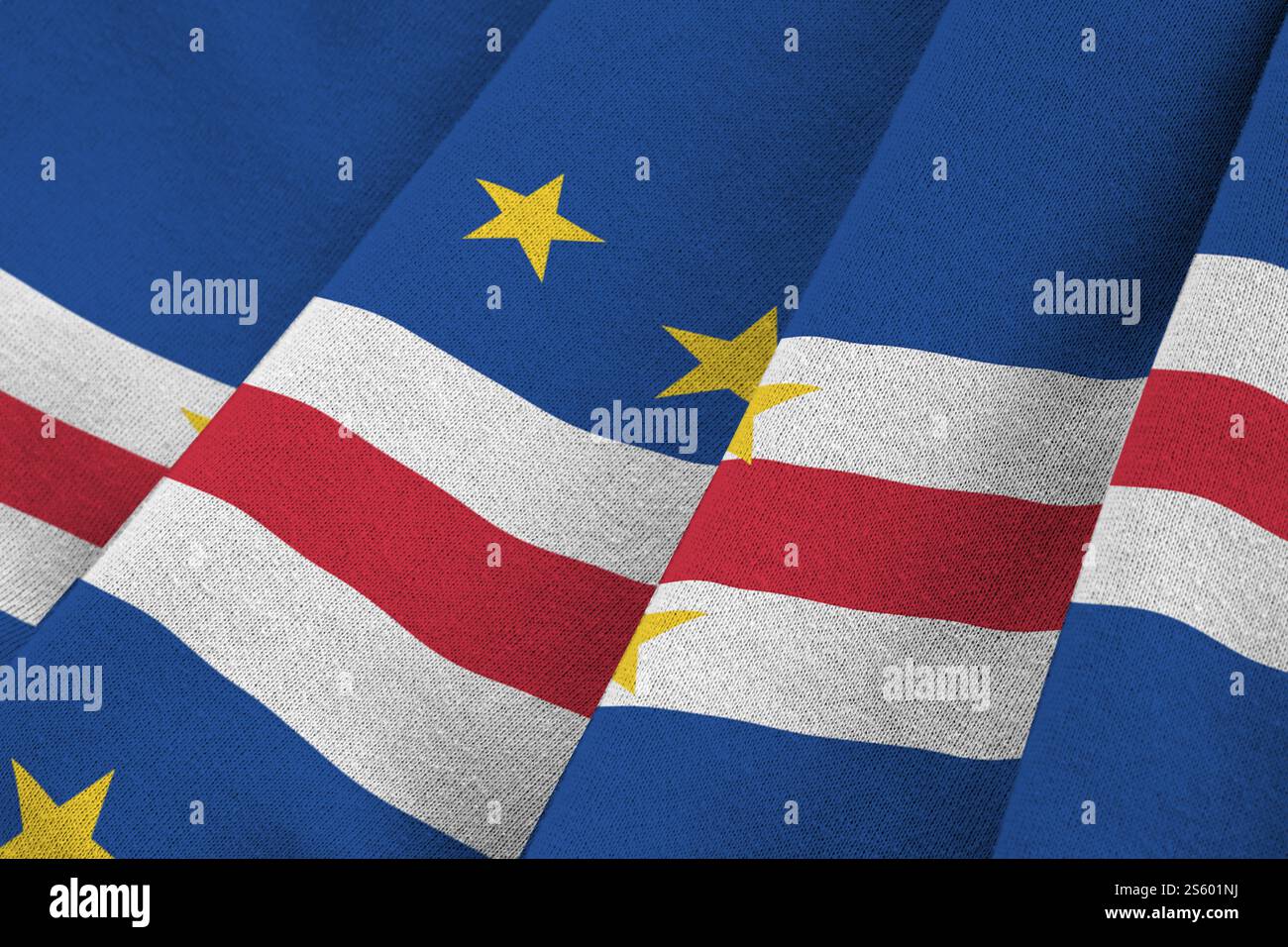 Cabo verde flag with big folds waving close up under the studio light ...