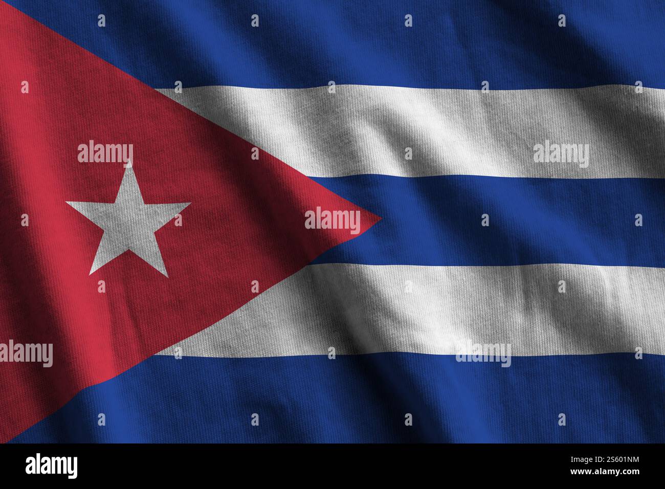 Cuba flag with big folds waving close up under the studio light indoors ...