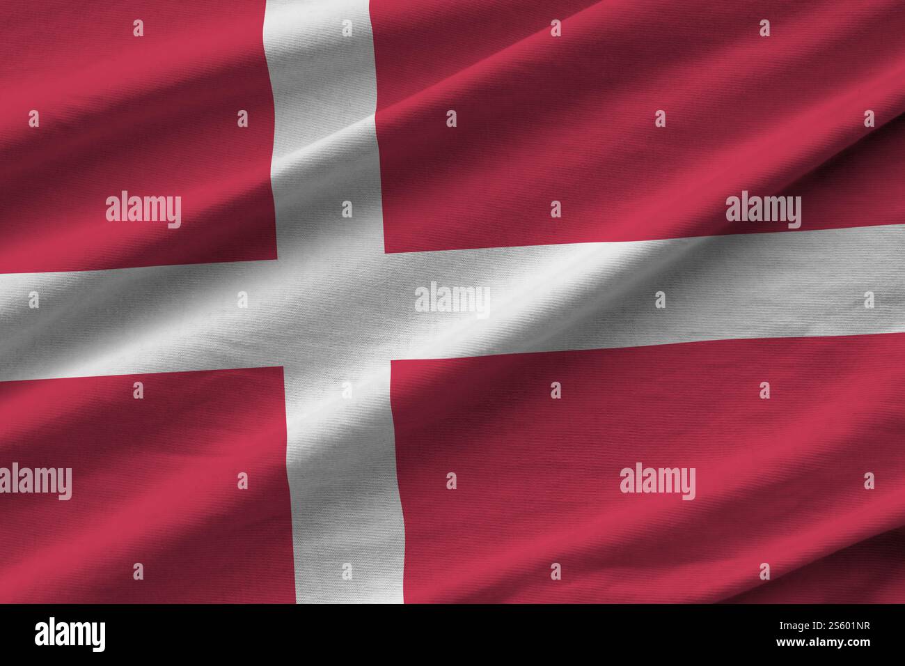 Denmark flag with big folds waving close up under the studio light ...
