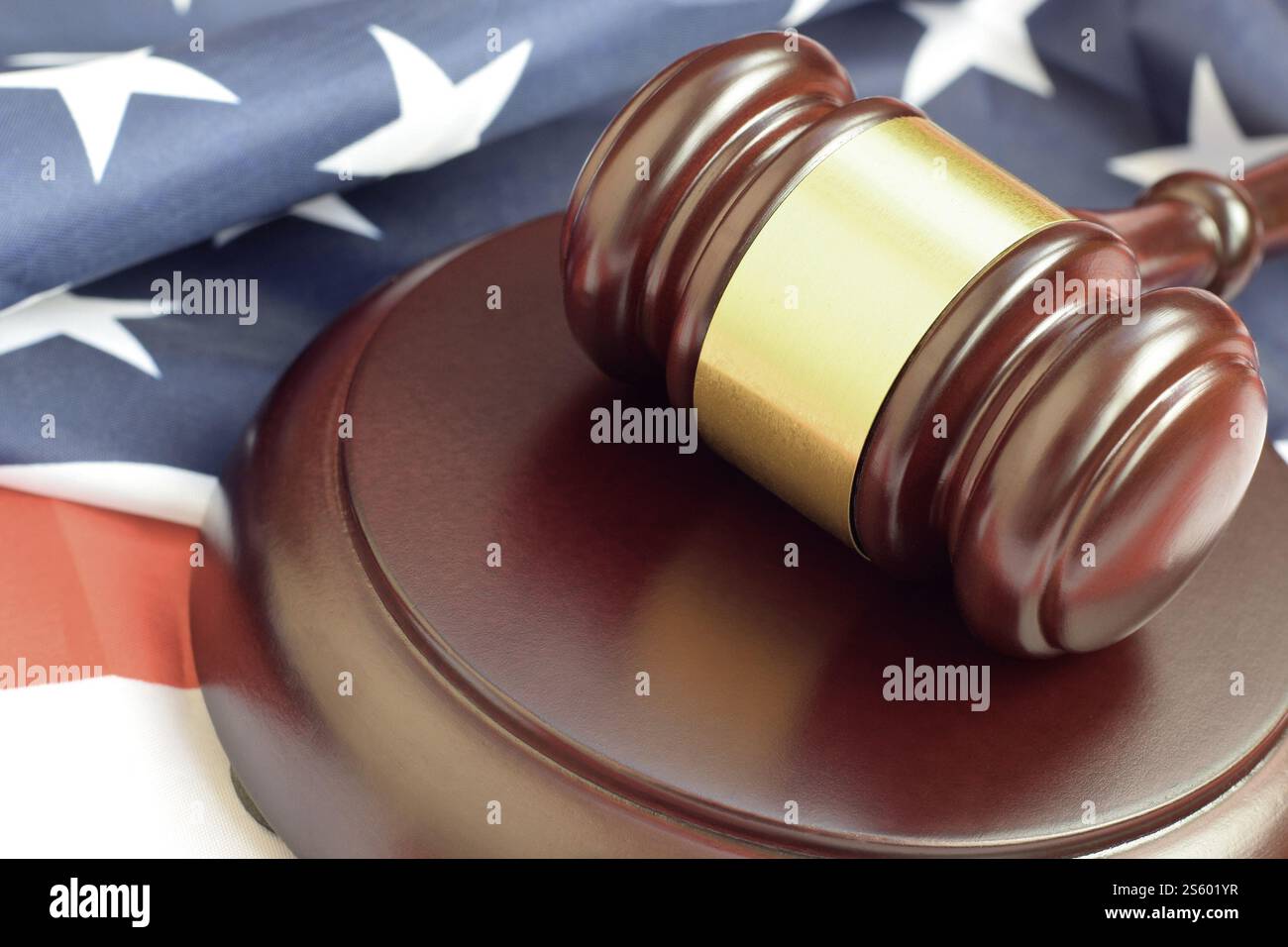 Justice mallet on United States flag in a courtroom during a judicial ...