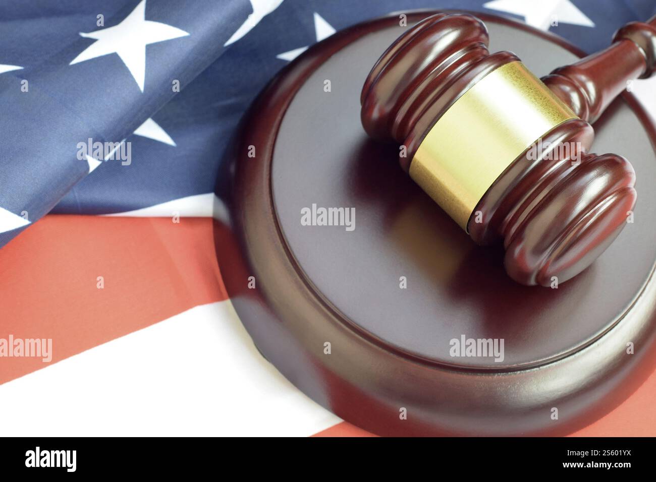 Justice mallet on United States flag in a courtroom during a judicial ...