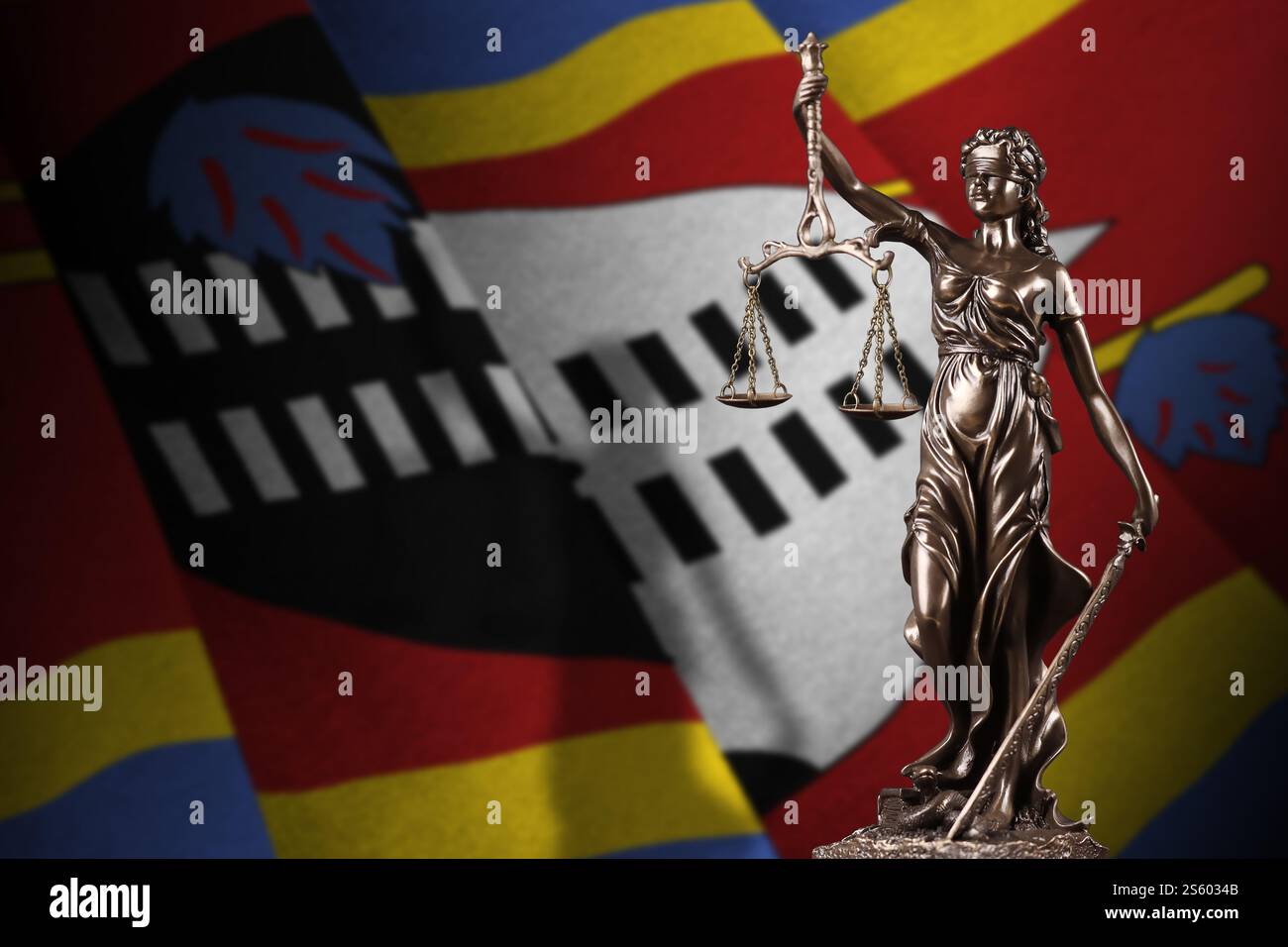 Swaziland flag with statue of lady justice and judicial scales in dark room. Concept of ...