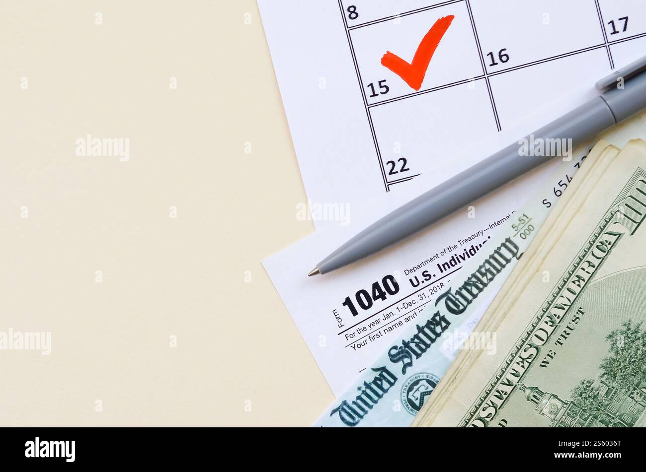 1040 Individual Income tax return form with Refund Check and hundred ...