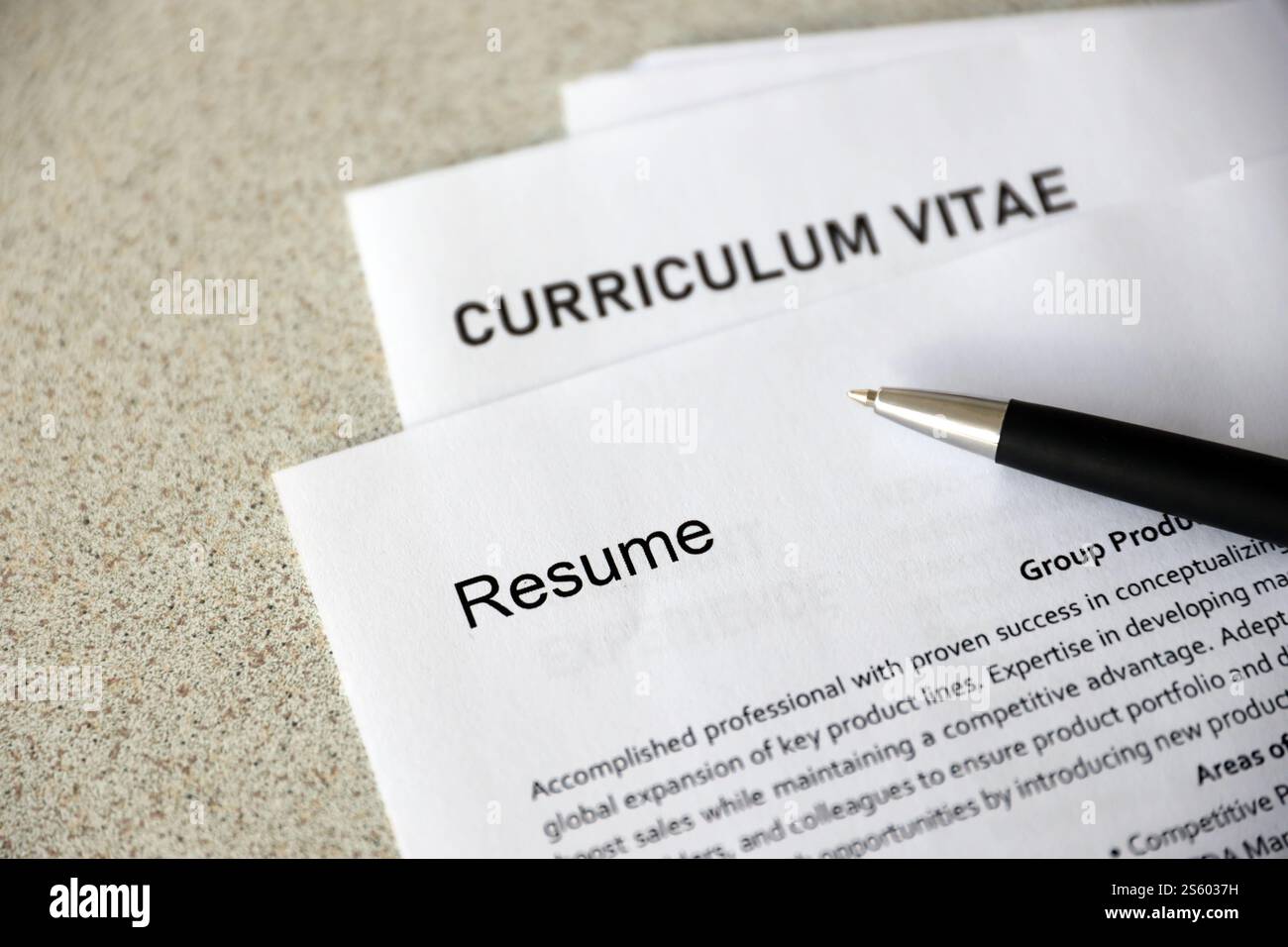 Top view of stack of office documents including resume and cv forms on ...