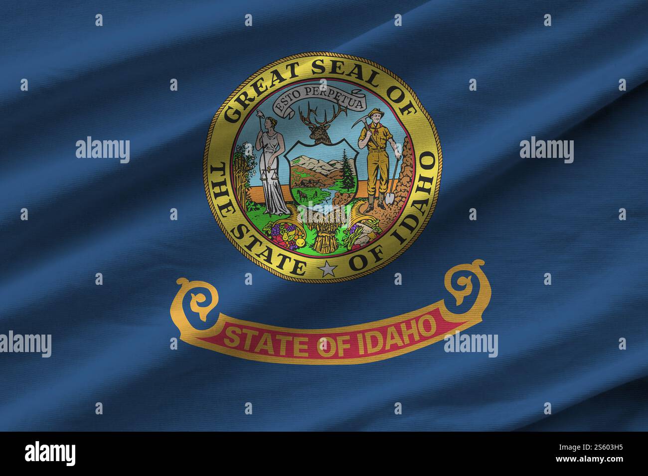 Idaho US state flag with big folds waving close up under the studio ...