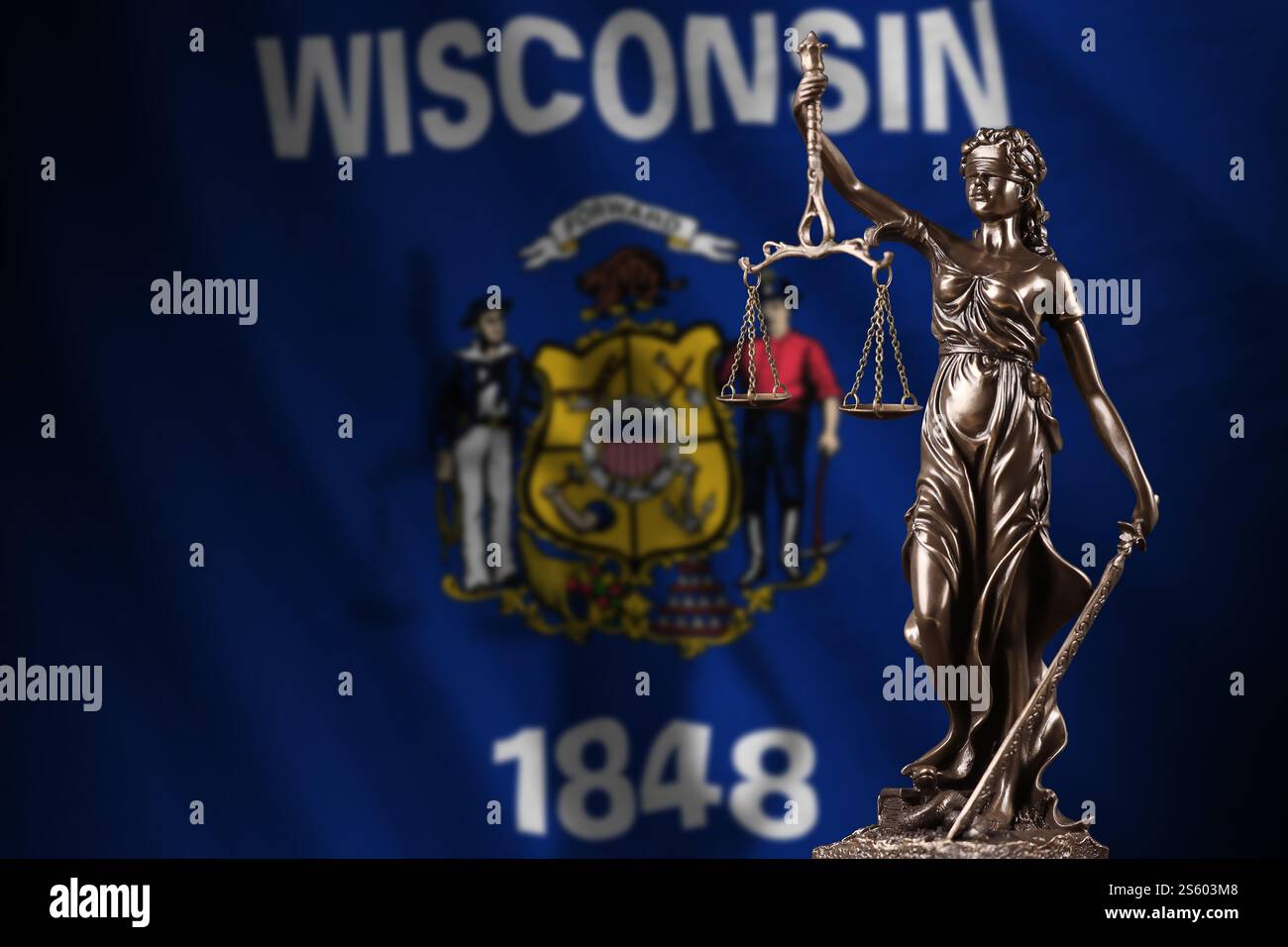 Wisconsin US state flag with statue of lady justice and judicial scales ...