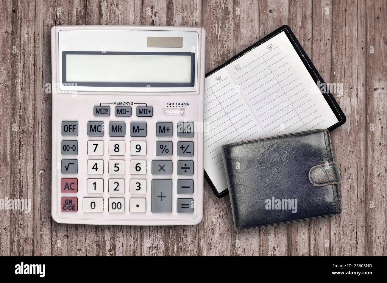 Office flat lay composition with big calculator, address book and black ...