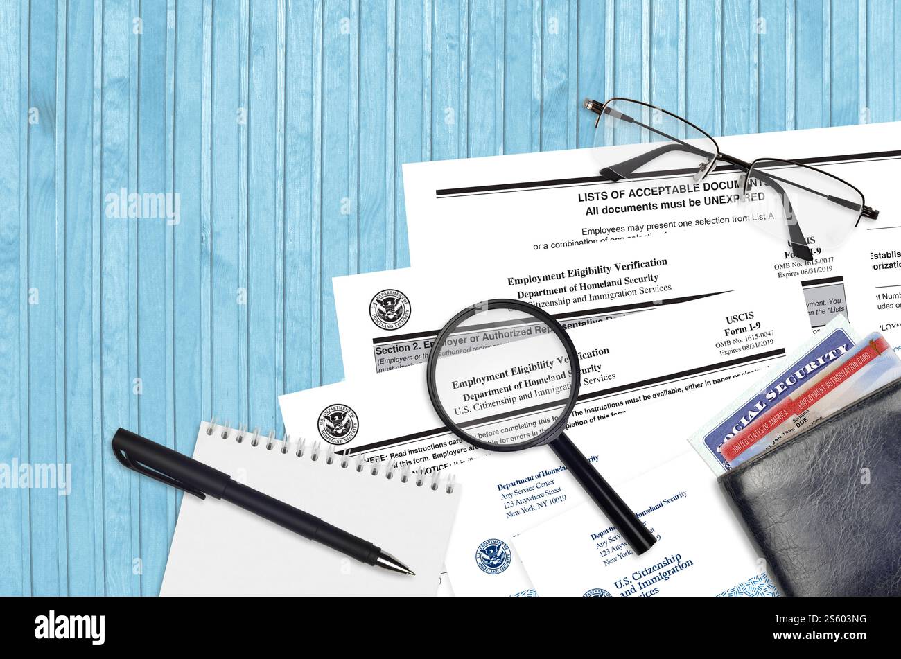 USCIS form I-9 Employment eligibility verification lies on flat lay ...
