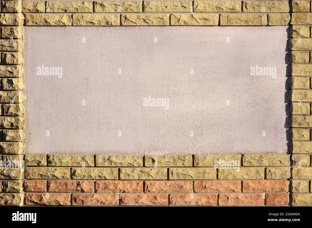 Frame made of masonry. Brick frame around the clean and light concrete ...