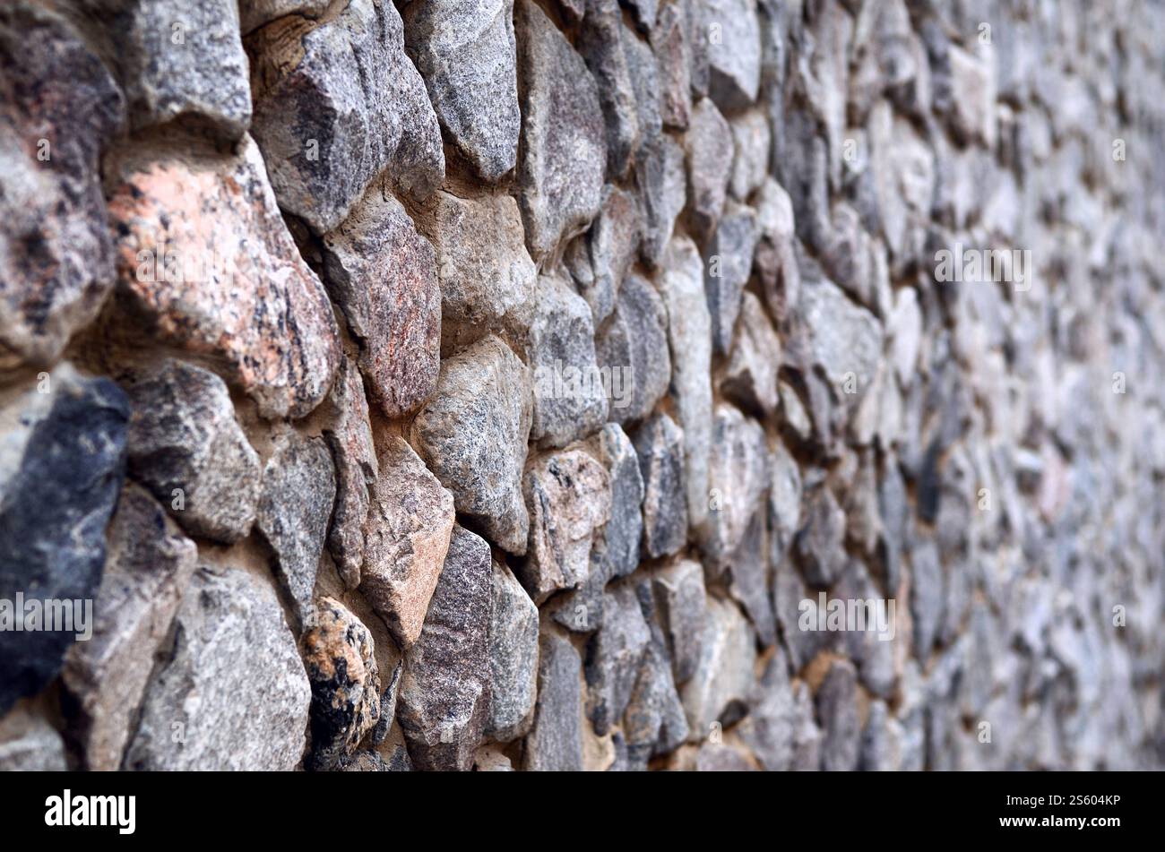 Background image of weathered stained thick and strong wall of rough ...