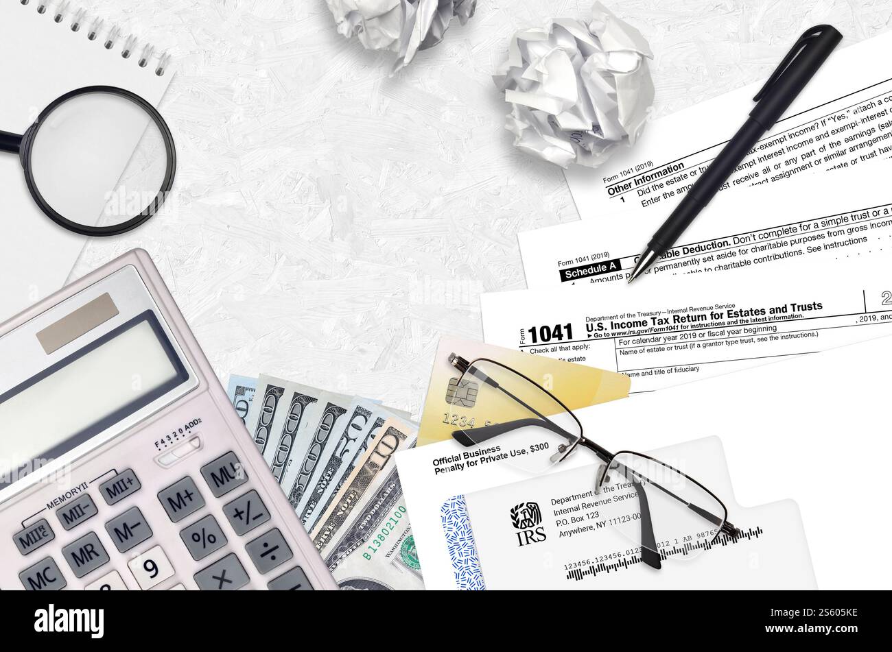 IRS form 1041 Income tax return for estates and trusts lies on flat lay ...