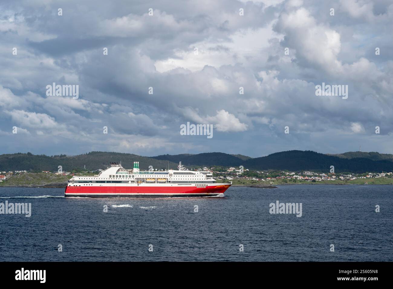 A large ferry boat, travelling between towns in southern Norway. The ...