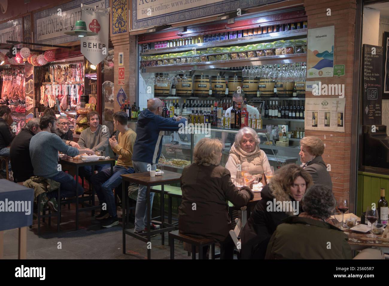Mercado De Triana, a Spanish food market. Triana local market lunchtime ...