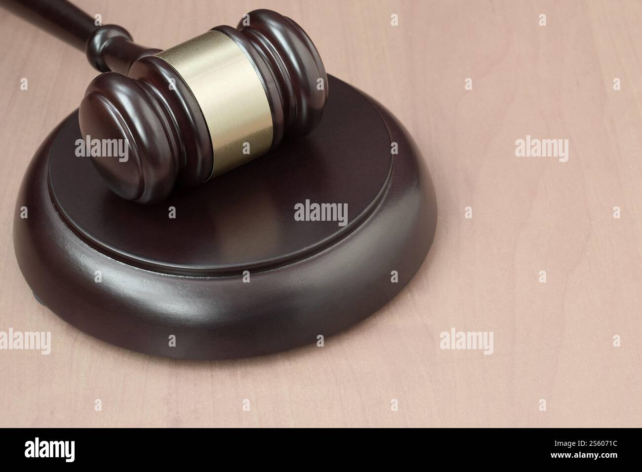 Justice mallet on wooden desk in a courtroom during a judicial trial ...