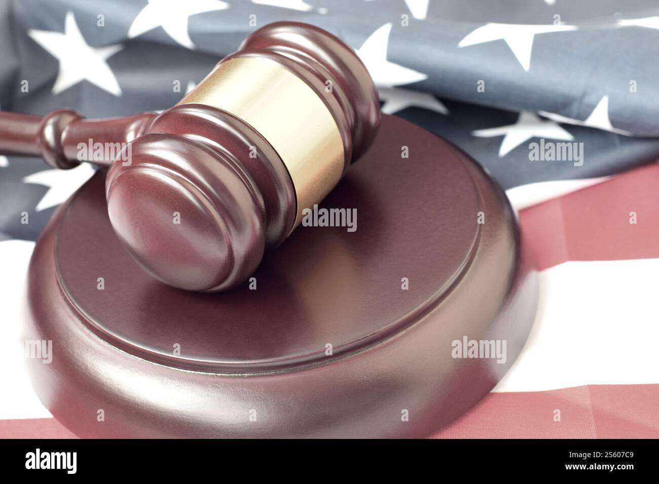 Justice mallet on United States flag in a courtroom during a judicial ...