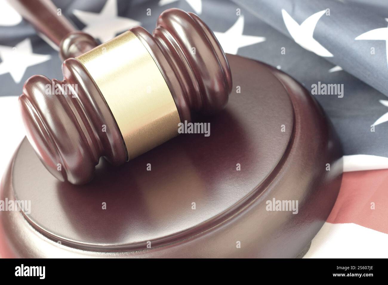 Justice mallet on United States flag in a courtroom during a judicial ...