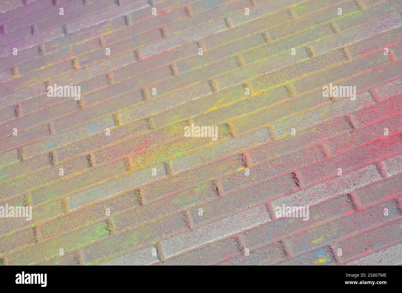 Multi colored earth, paving slabs, powder coated with dry colors at the ...