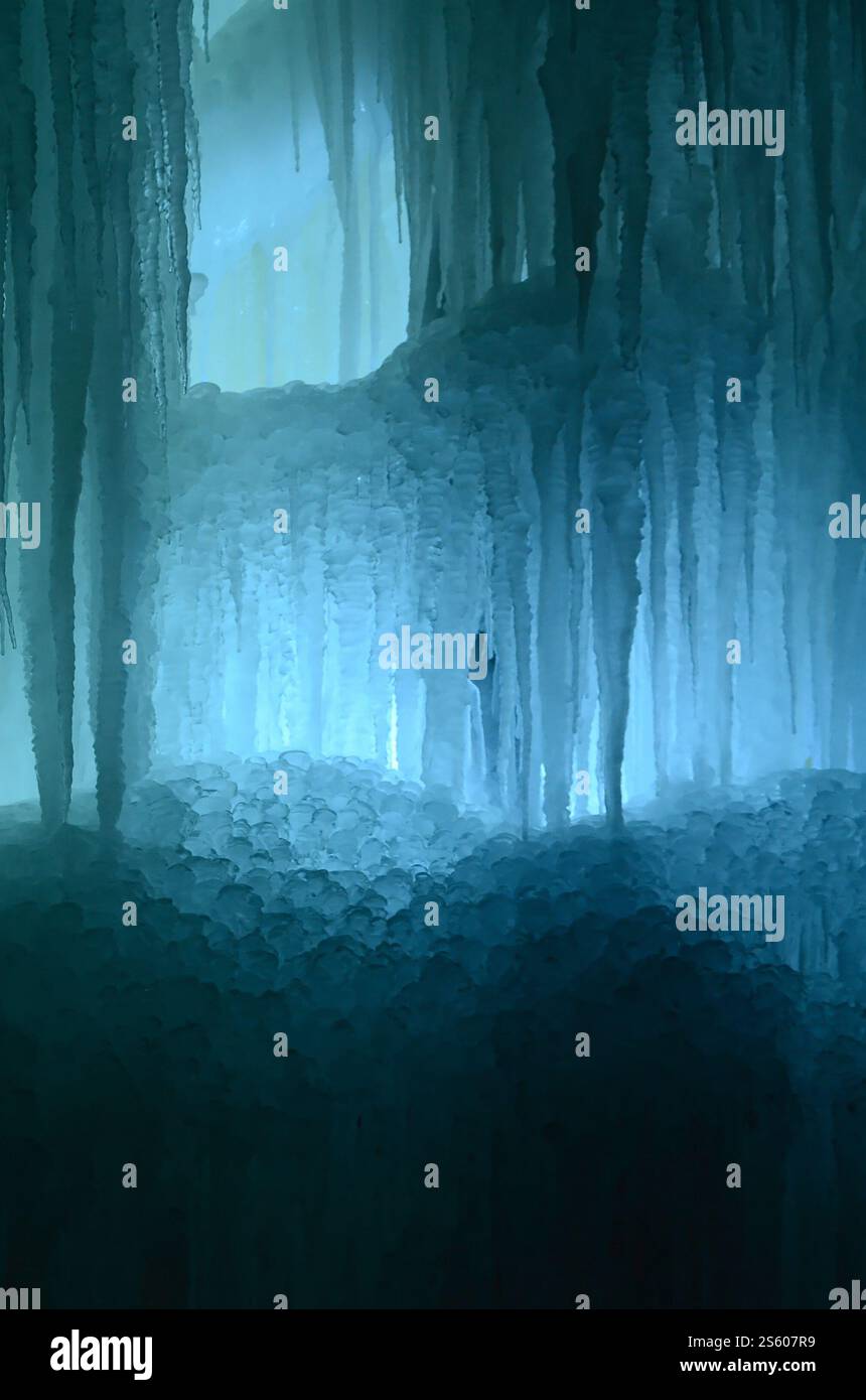 Huge ice icicles. Fragment of large blocks of ice frozen waterfall of ...