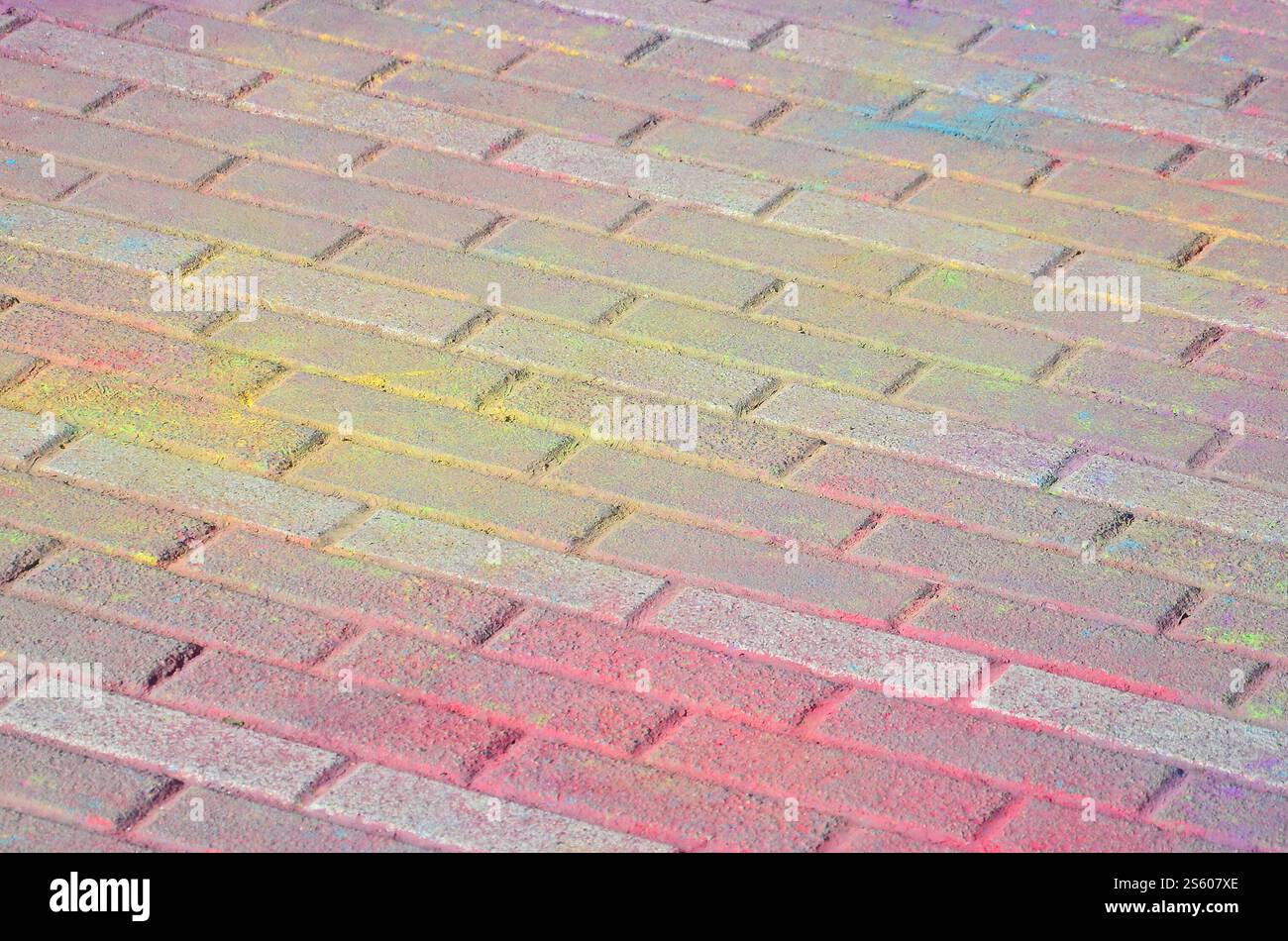 Multi colored earth, paving slabs, powder coated with dry colors at the ...