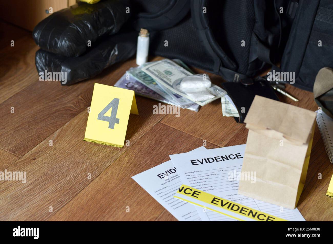 Evidence Chain of Custody Labels and brown paper bag lies with big ...