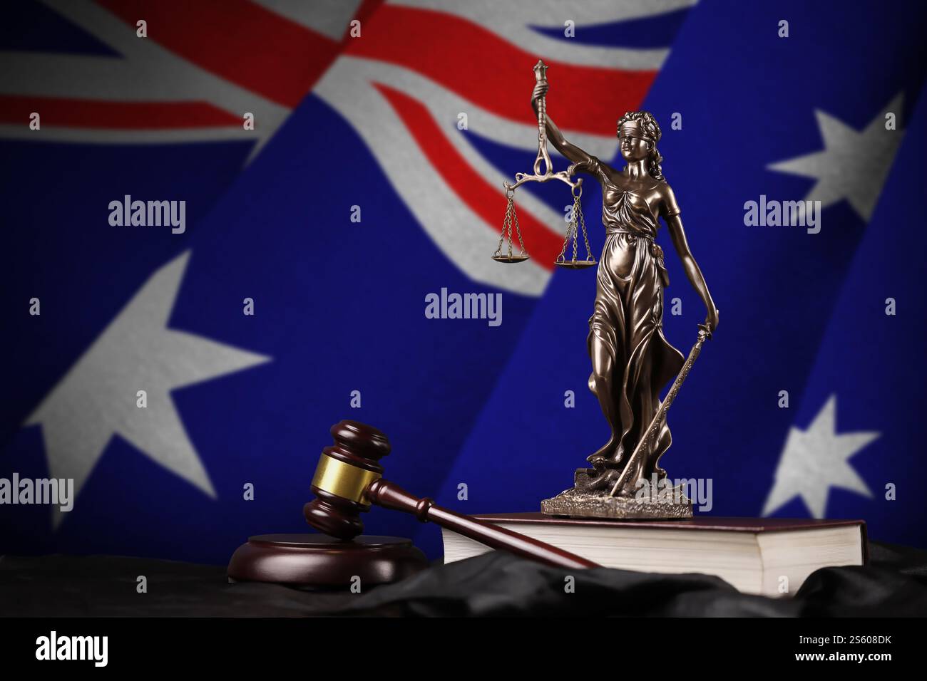 Australia flag with statue of lady justice, constitution and judge ...