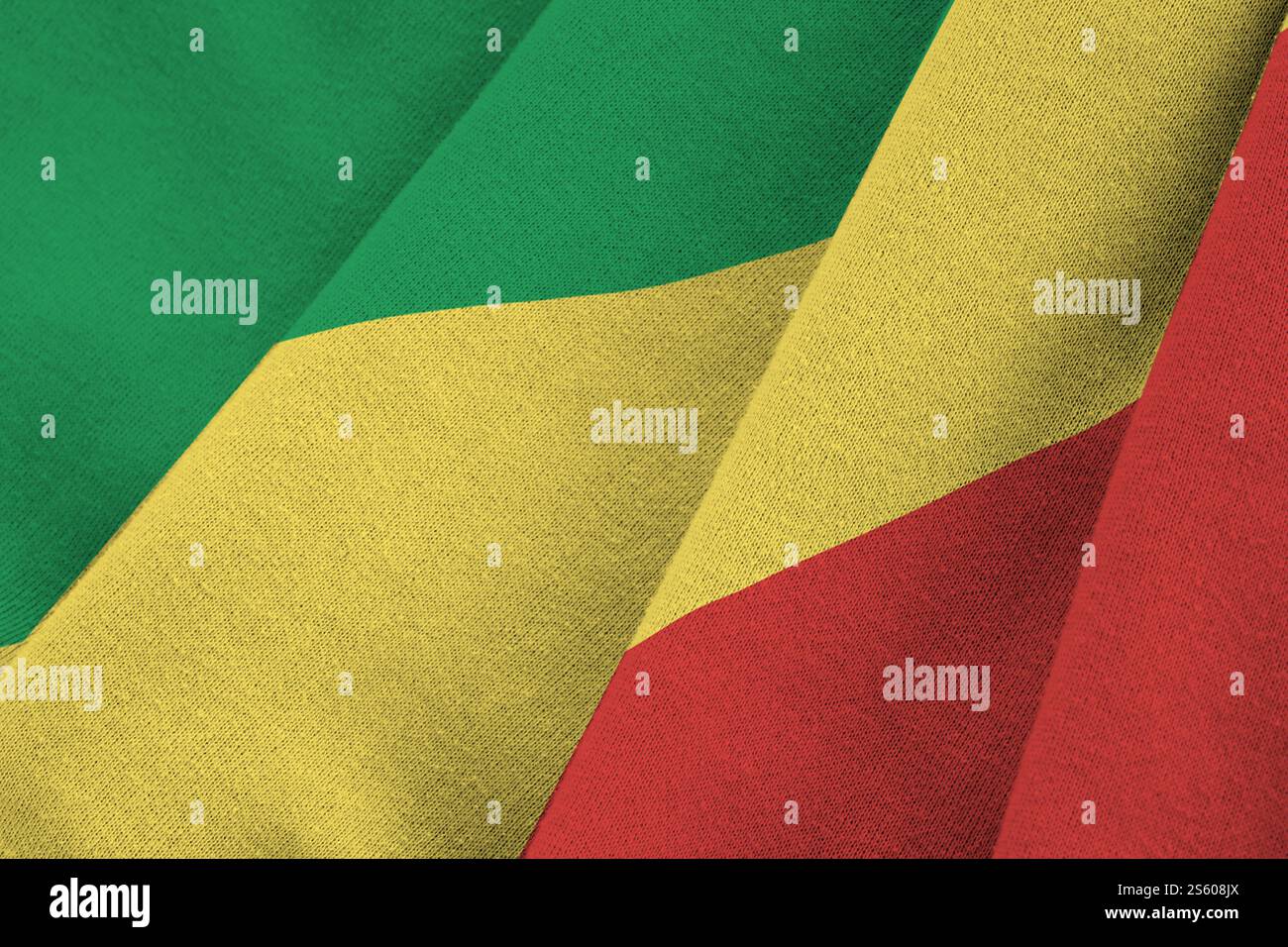 Congo flag with big folds waving close up under the studio light ...