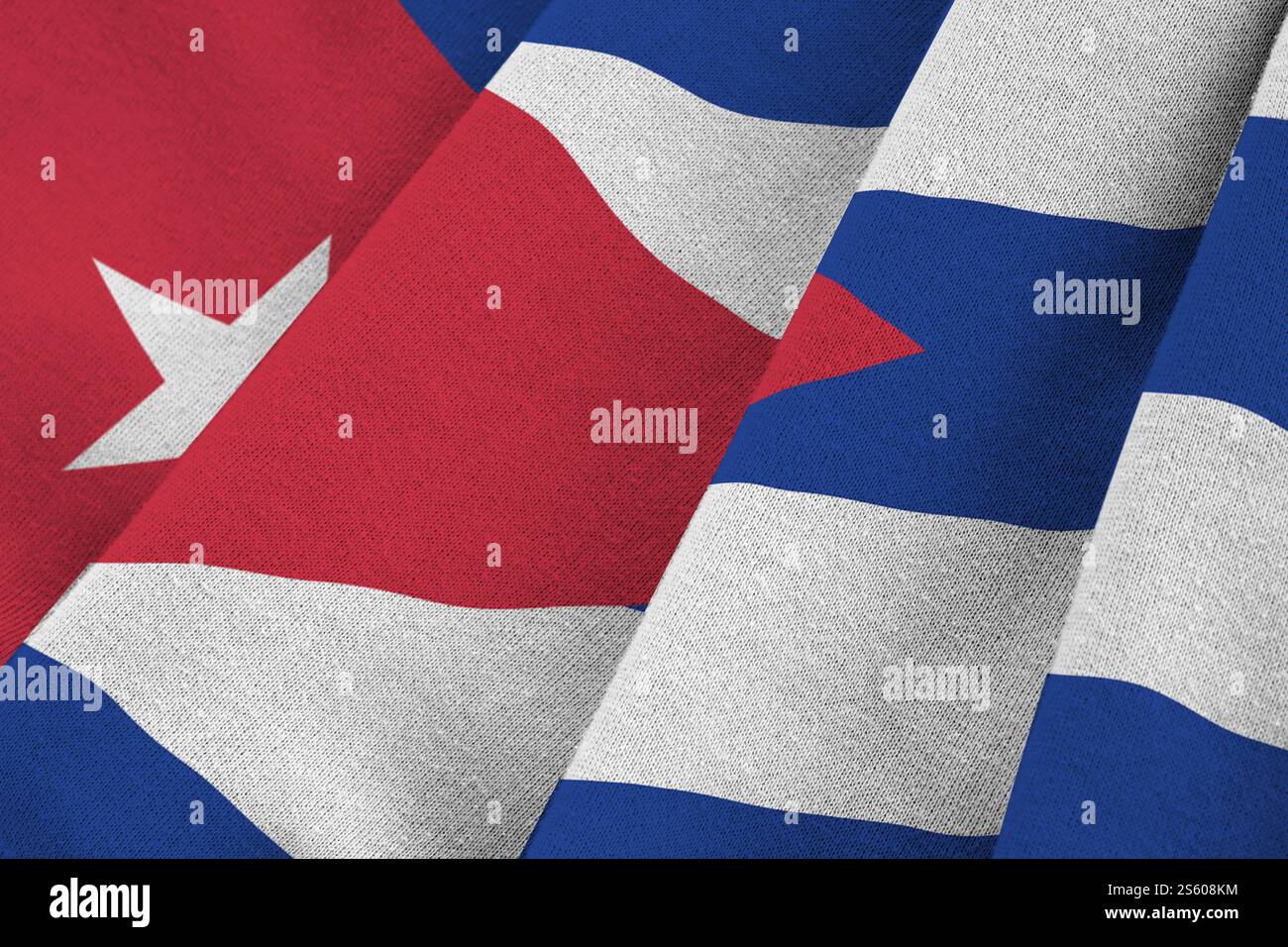 Cuba flag with big folds waving close up under the studio light indoors ...