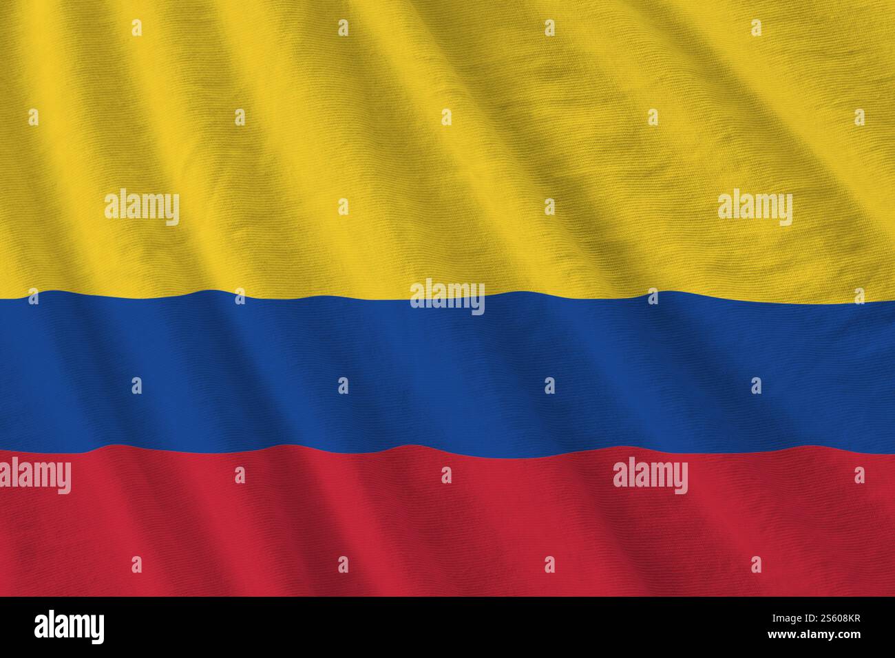 Colombia flag with big folds waving close up under the studio light ...