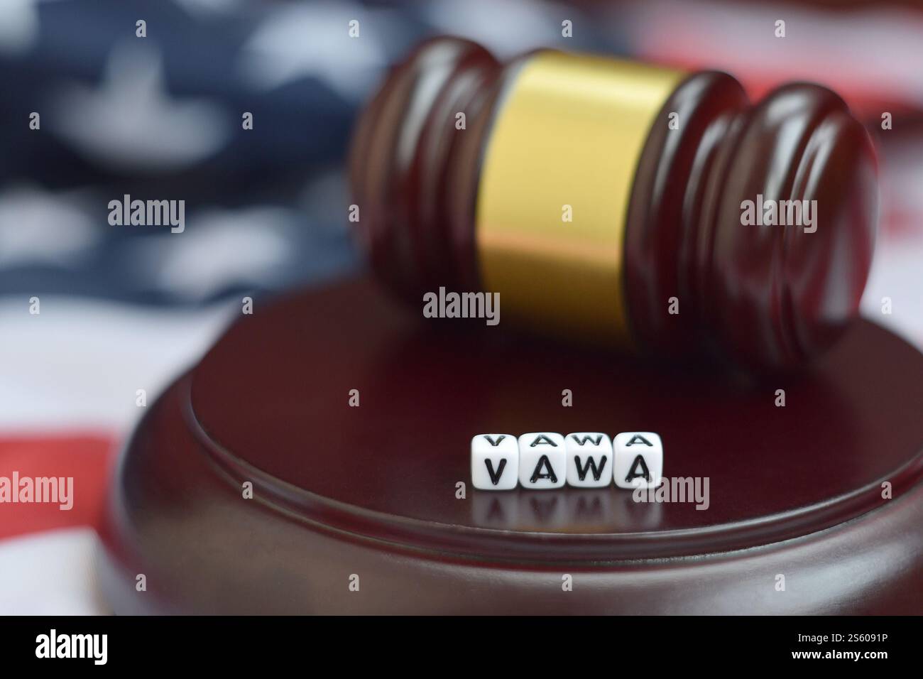 Justice mallet and VAWA acronym close up. Violence against women act ...