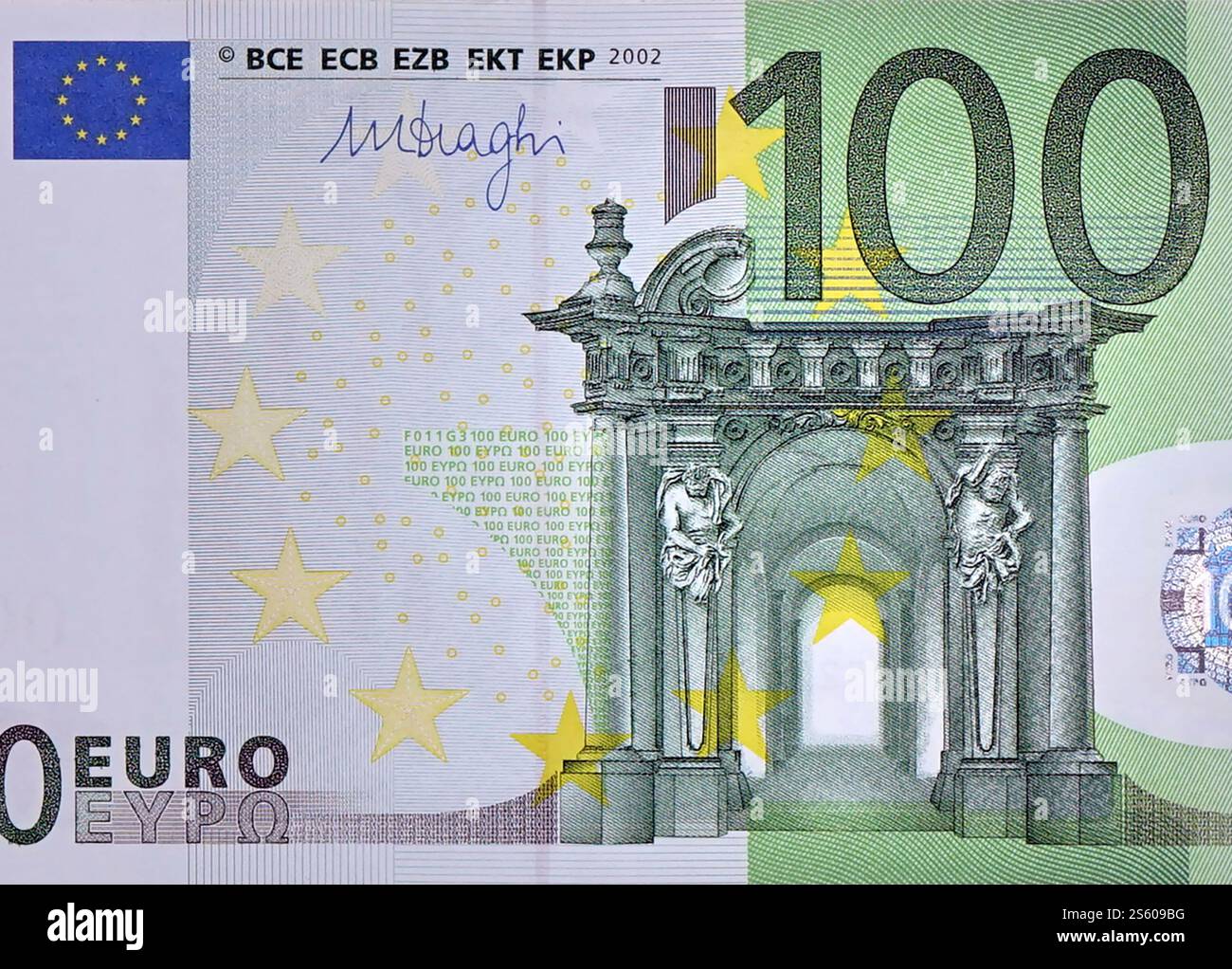 Front part of 100 euro banknote close-up with small green details ...