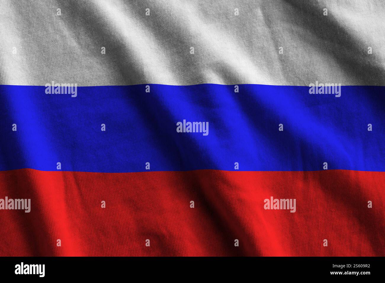 Russia flag with big folds waving close up under the studio light ...