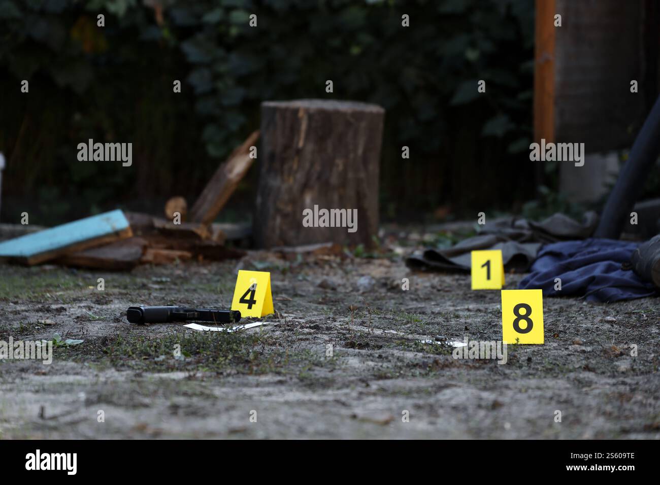 Evidence with yellow CSI marker for evidence numbering on the ...