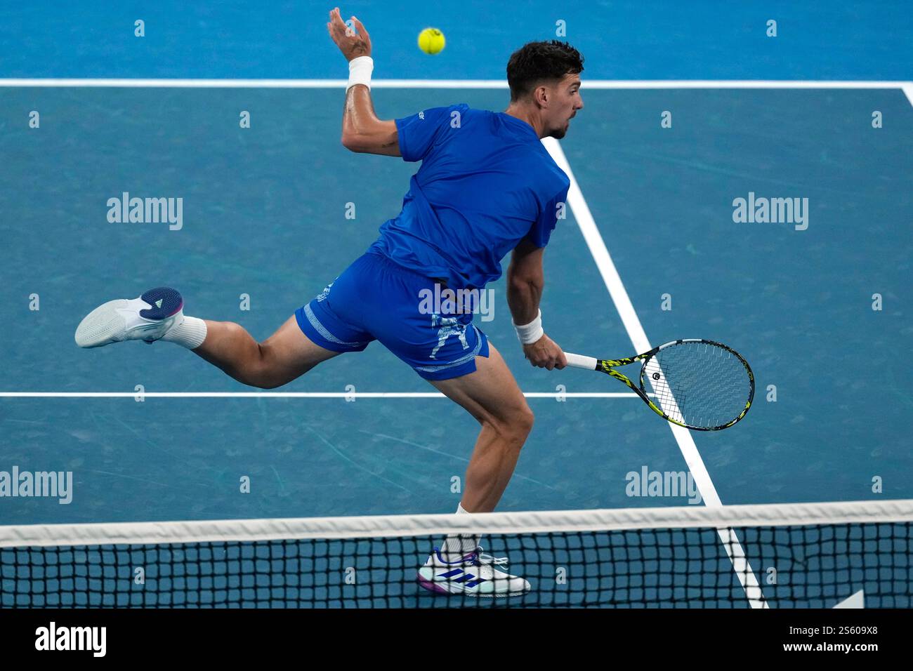 Thanasi Kokkinakis of Australia plays a backhand return to Jack Draper ...