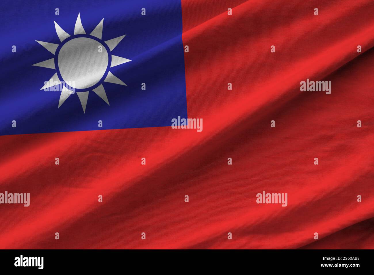 Taiwan flag with big folds waving close up under the studio light ...