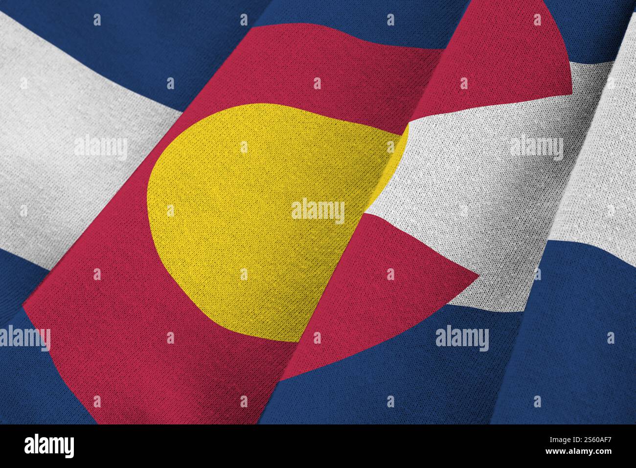 Colorado US state flag with big folds waving close up under the studio ...