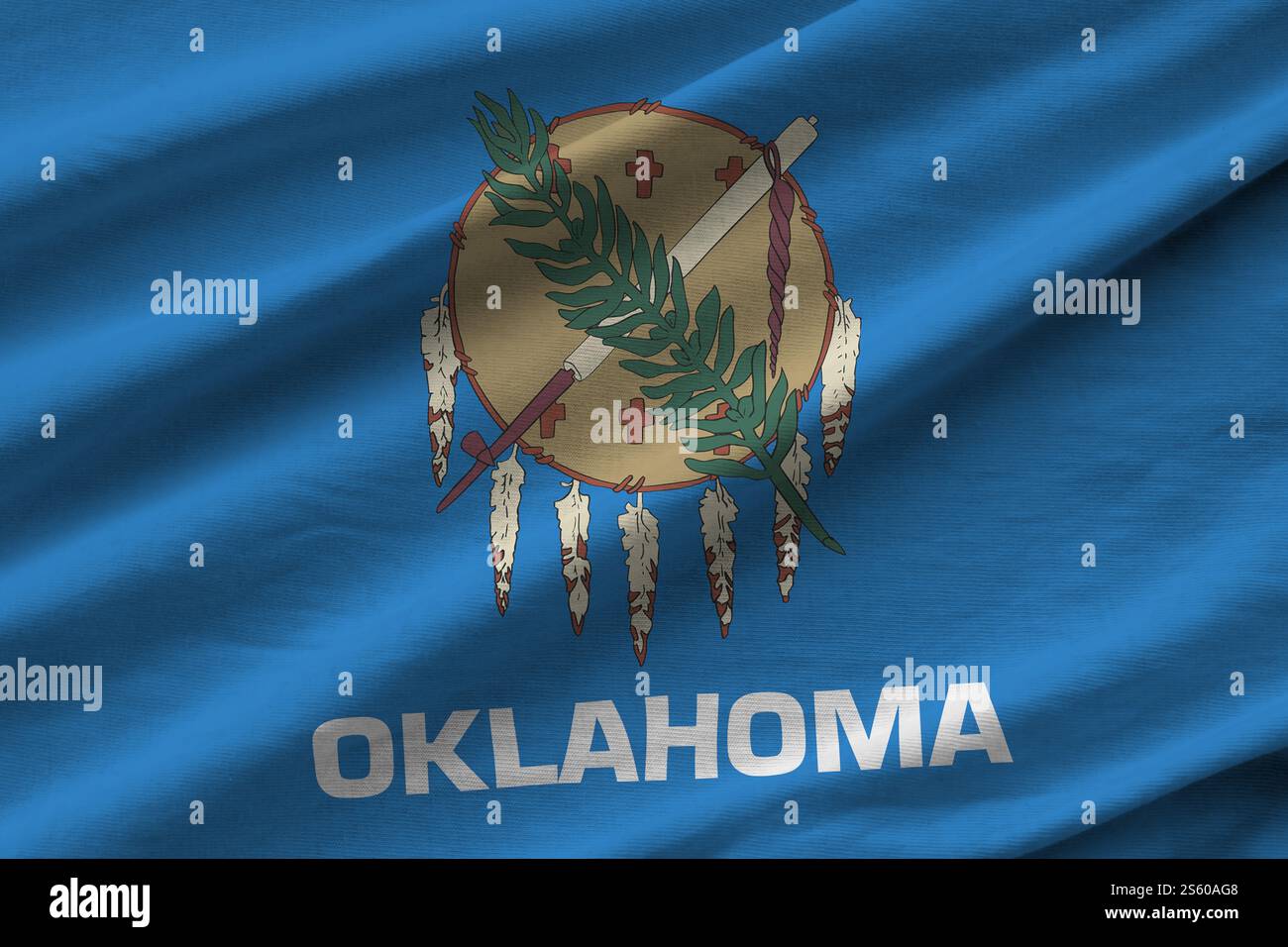 Oklahoma US state flag with big folds waving close up under the studio ...