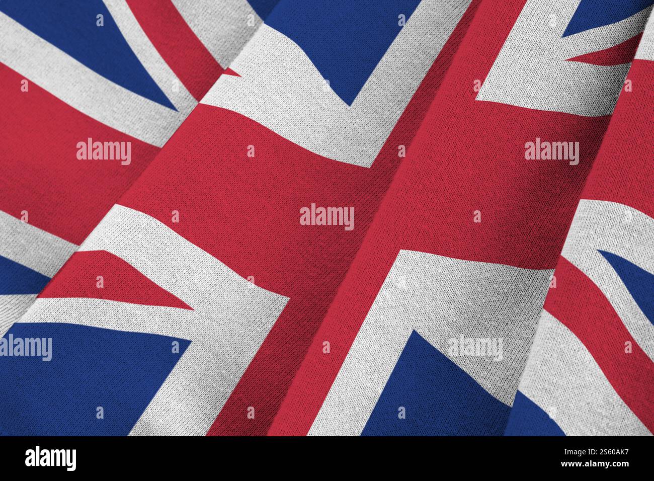 Great britain flag with big folds waving close up under the studio ...