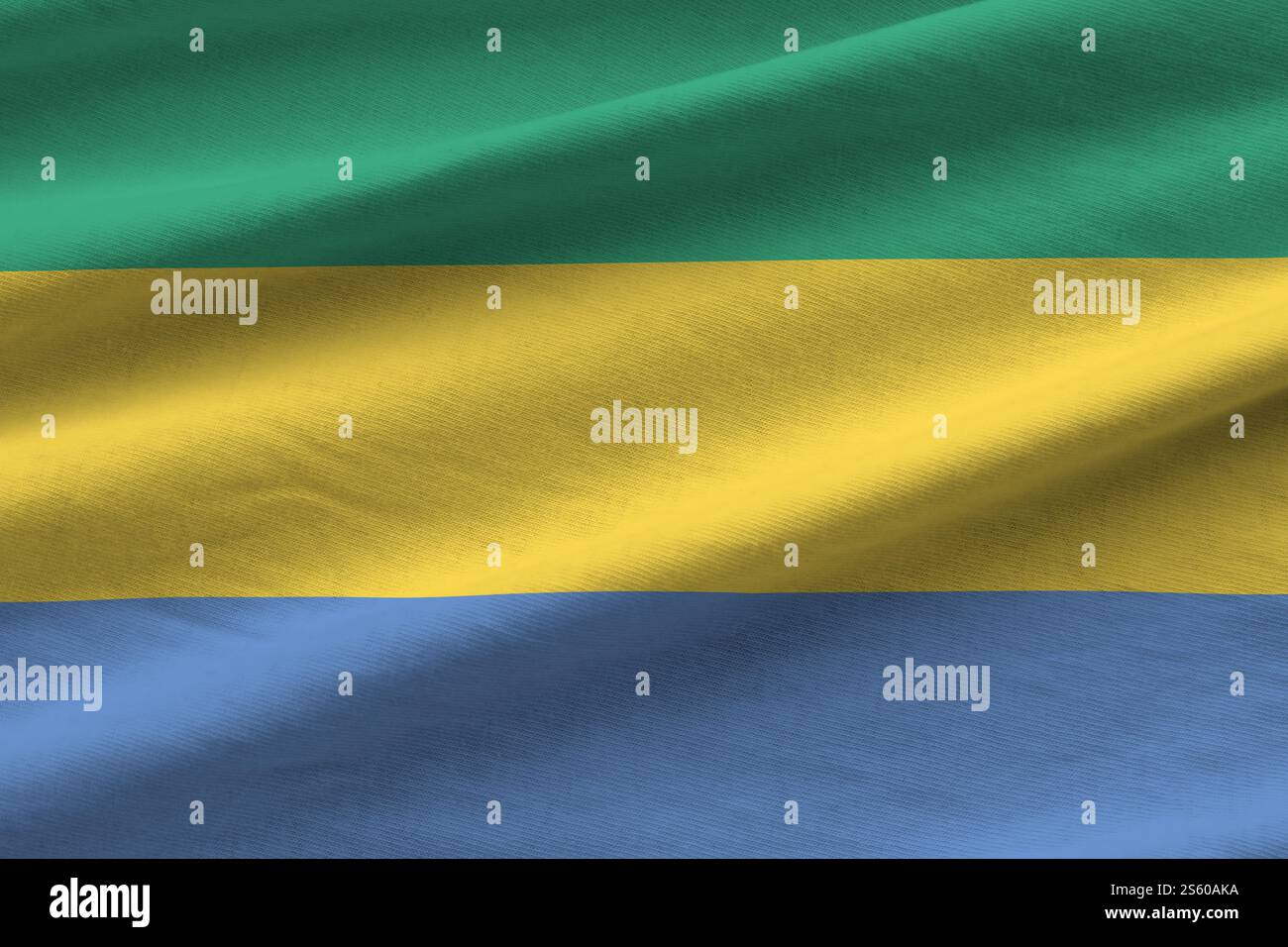 Gabon flag with big folds waving close up under the studio light ...