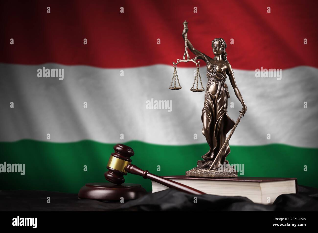 Hungary flag with statue of lady justice, constitution and judge hammer ...