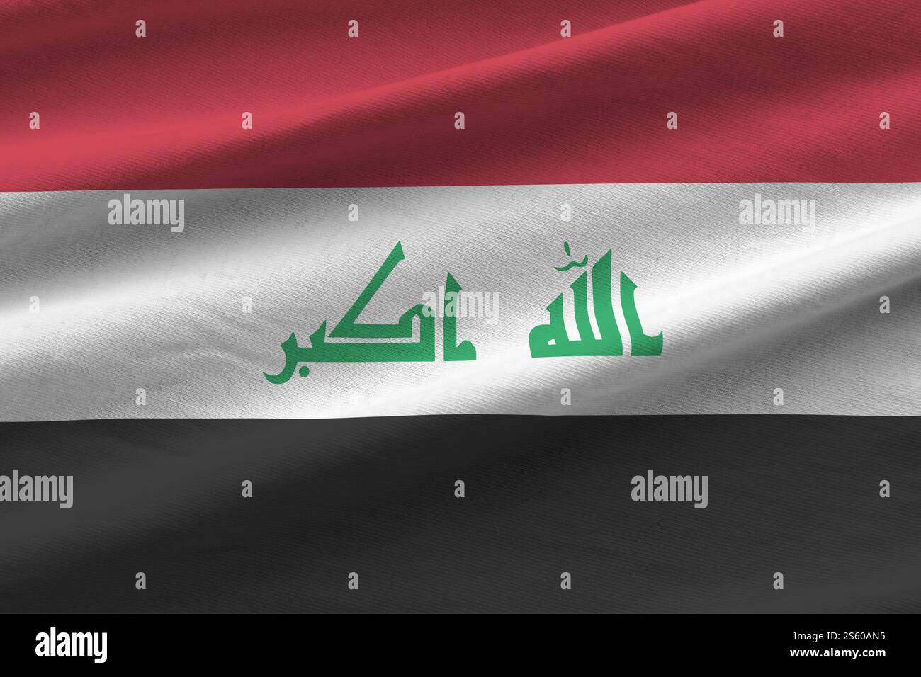 Iraq flag with big folds waving close up under the studio light indoors ...