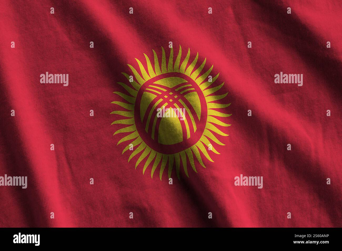 Kyrgyzstan flag with big folds waving close up under the studio light ...