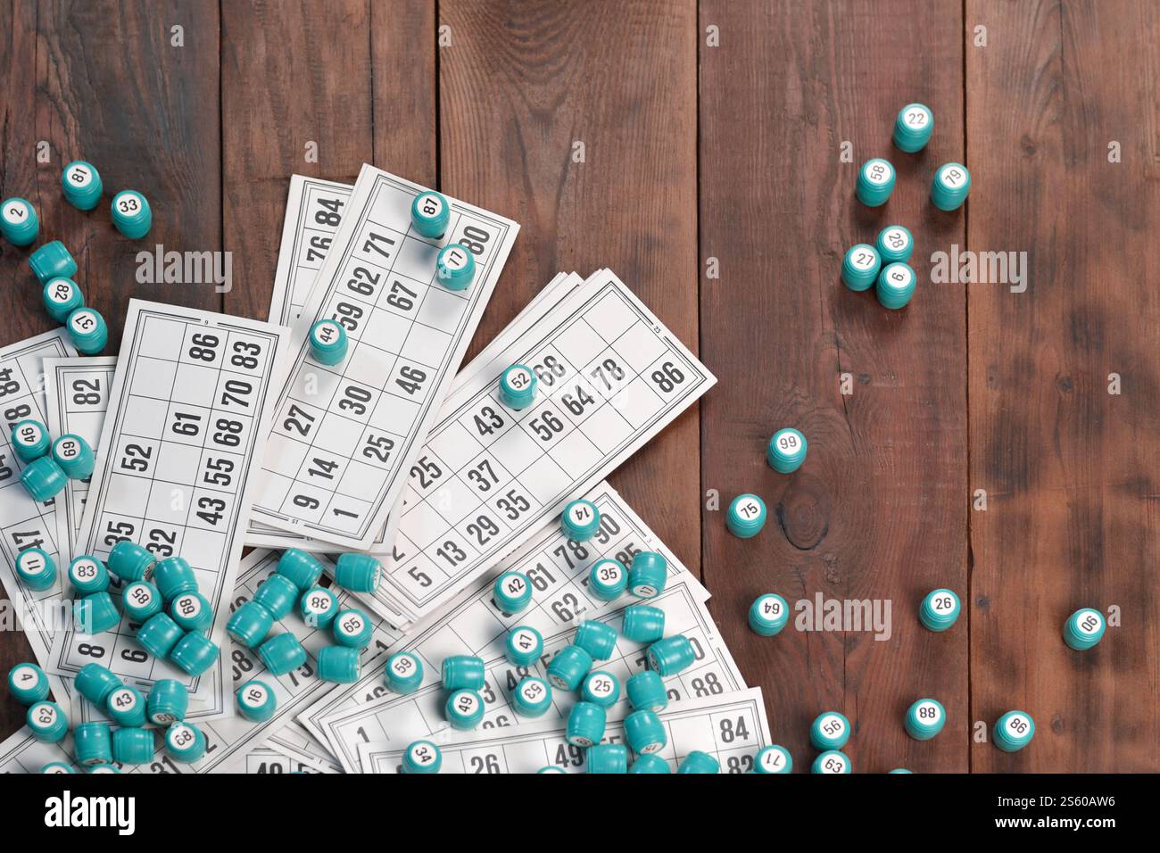 Many barrels with numbers and cards for lotto or russian bingo table ...