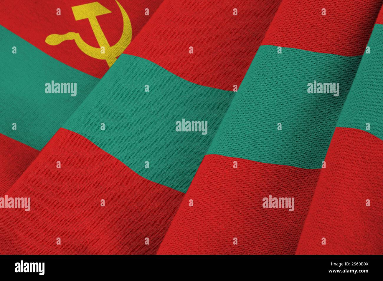 Transnistria flag with big folds waving close up under the studio light ...