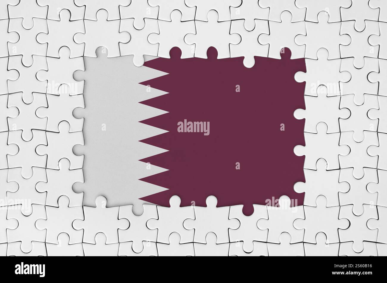Qatar flag in frame of white puzzle pieces with missing central parts ...